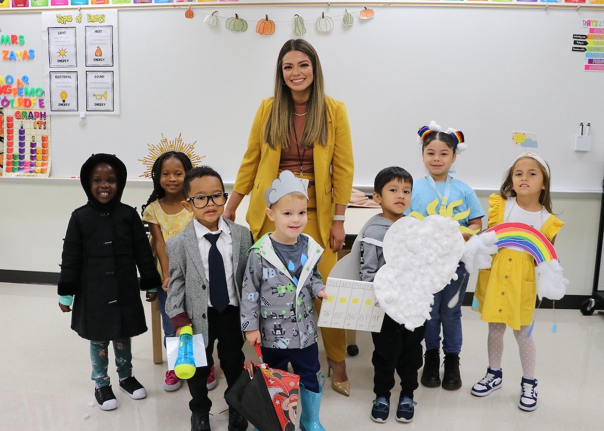 WFAA meteorologist Mariel Ruiz visits with pre-K students